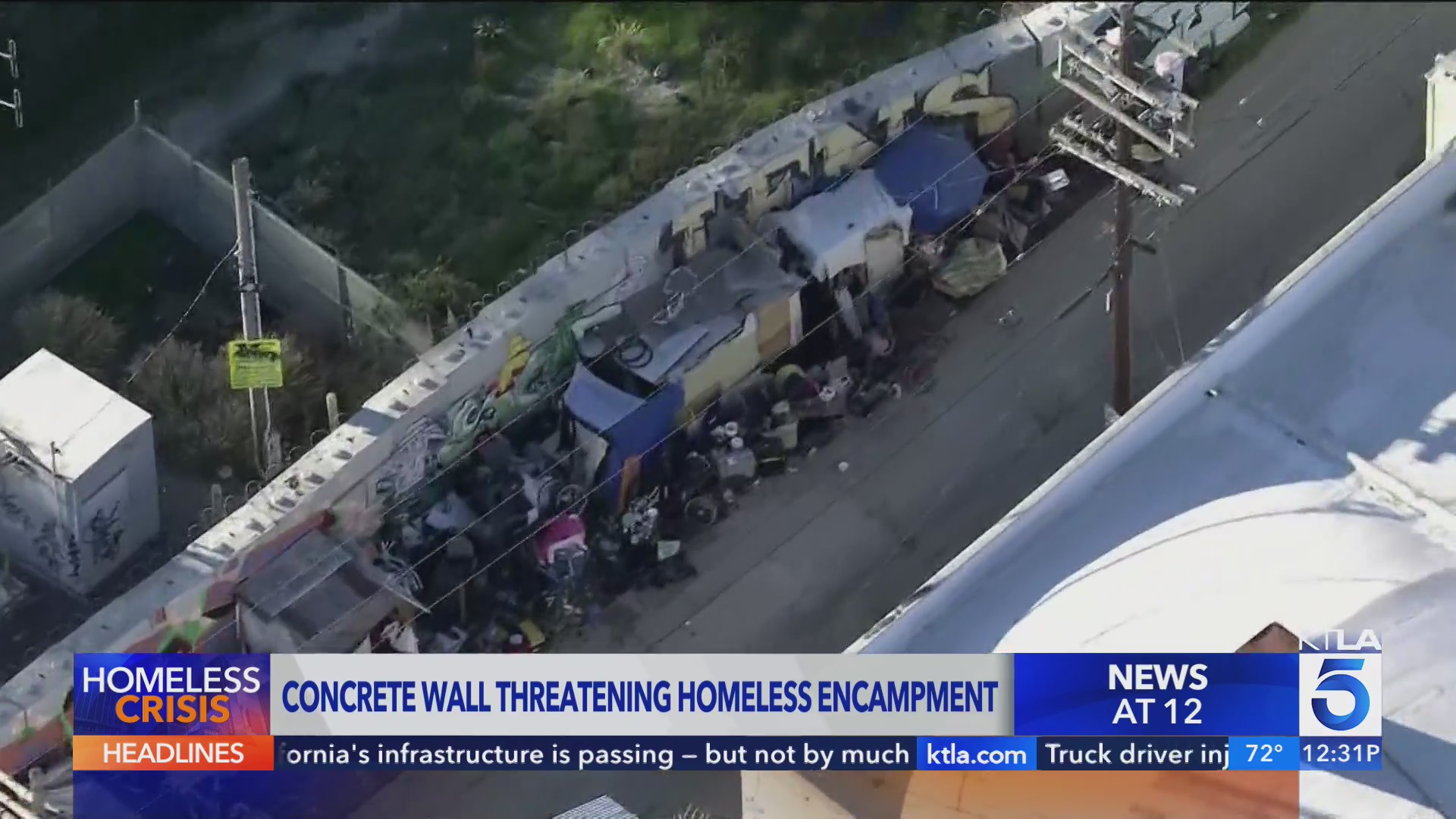 Community members raise concern about concrete wall falling onto ...