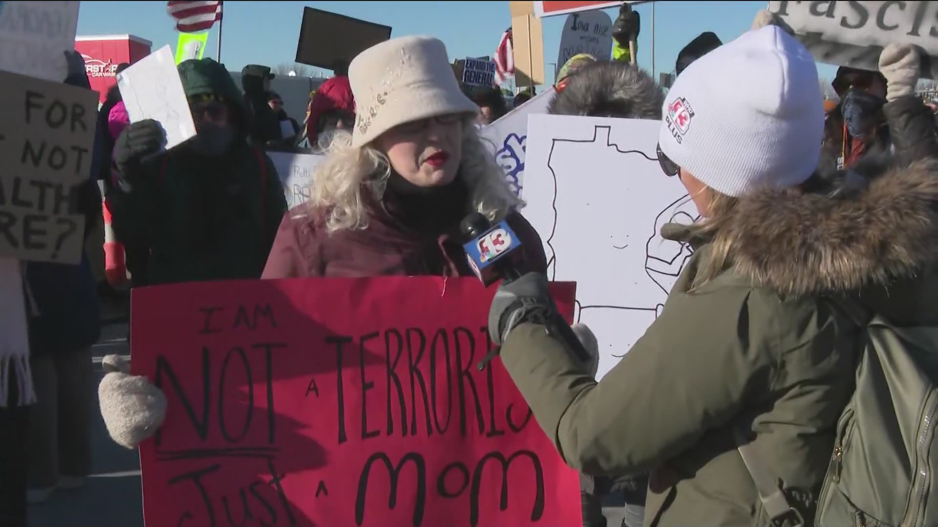 Large crowd of protesters gathered in Clive ahead of Presidential visit ...