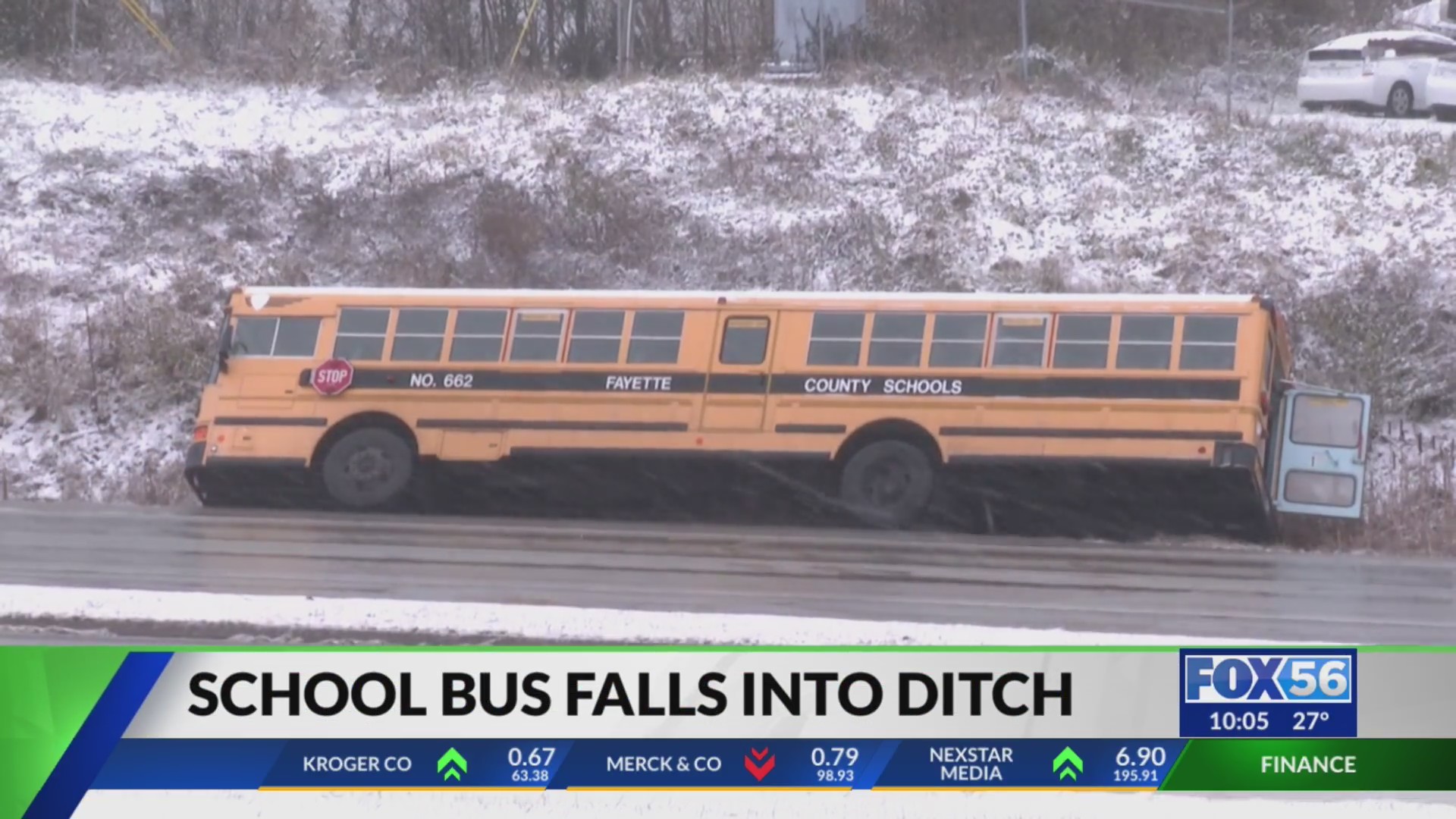 Lexington school bus falls on its side after section of road gives way ...