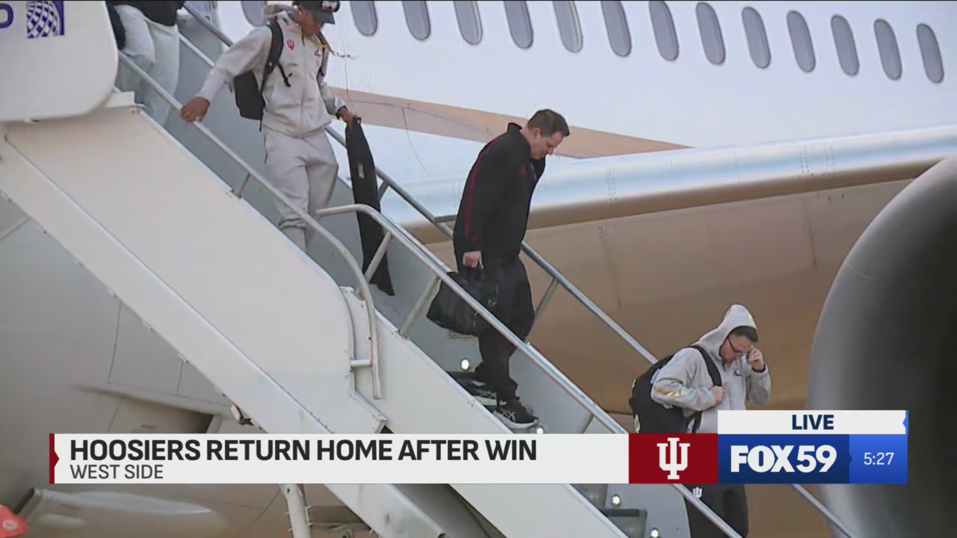 Coach Cignetti, Hoosiers get off plane in Indianapolis – Fox 59